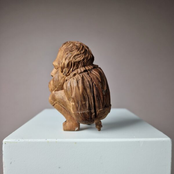 Een miniatuur van een poepende man - Quellinus Oude kunst en Antiek